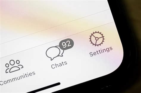 premium photo smart phone screen with 92 unread chat messages
