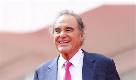 Oliver Stone Tells Russell Brand He Fears Biden May Start World War 3