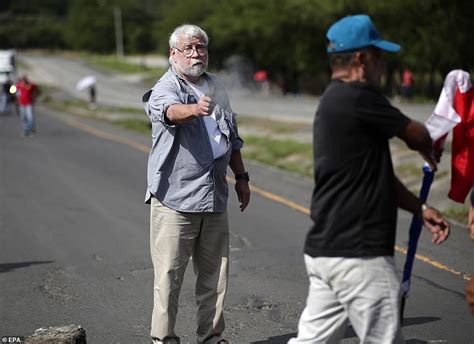 Motorist Shoots Dead Two Environmental Protesters Blocking A Road