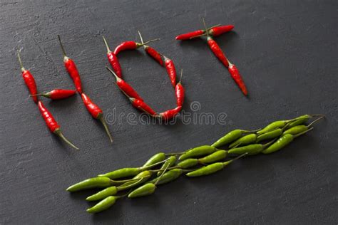 Word Sex Red Hot Chili Peppers On Black Background On Black Table Swx