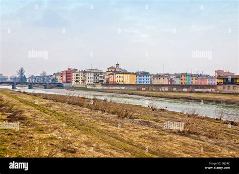 Parma River With Typical City Houses And Bridge In Winter Day Stock