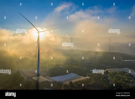 Aerial View Of Windmill Or Wind Farm In Fog At Cau Dat Town Da Lat City Lam Dong Vietnam