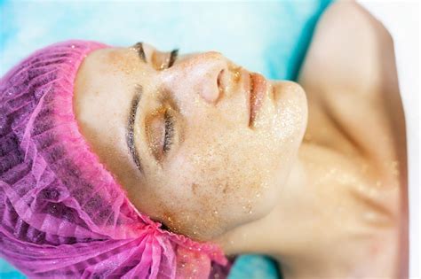 Premium Photo Woman Getting Facial Care In Spa Salon