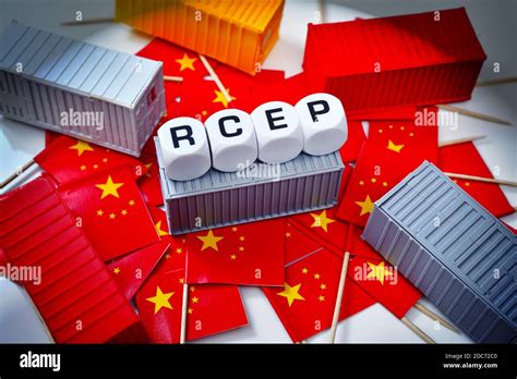 Letter Cubes Forming Rcep On Container And Flags Of The Peoples