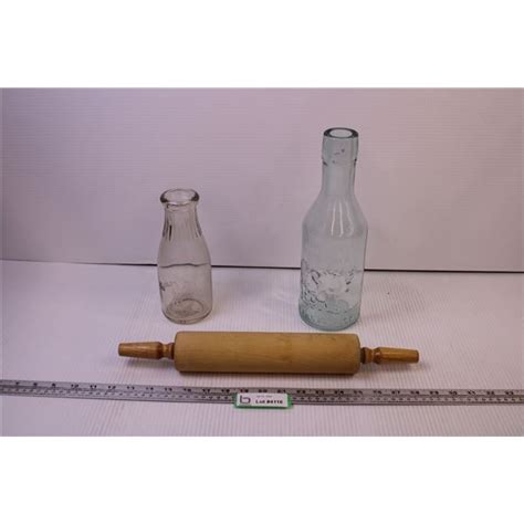 2 Milk Bottles Rolling Pin Bodnarus Auctioneering
