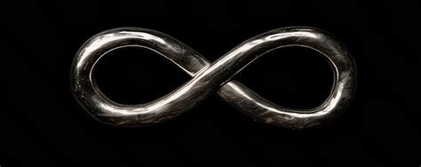 Premium Photo Metal Object Shaped Like An Infinite Sign