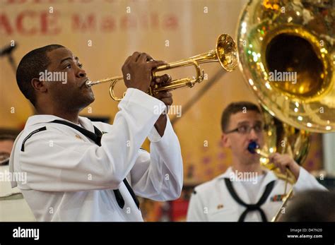 Musician 3rd Class Michael Bookman A Member Of The U S 7th Fleet Band Performs For Over 3 100