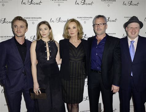 Elizabeth Olsen In Secret Los Angeles Premiere February 2014