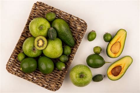 Free Photo Top View Of Fruits Such As Green Apples Feijoas Avocados