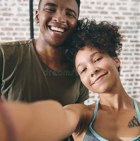 The Post Workout Mood Two Sporty Young People Taking A Selfie At The