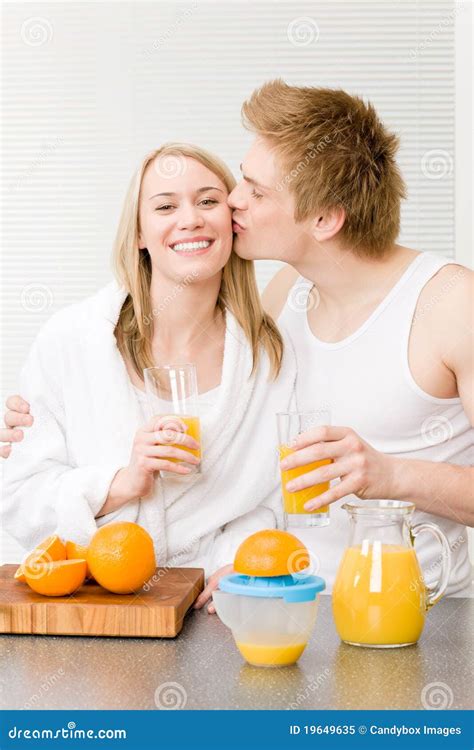 Breakfast Kissing Couple Enjoy Orange Juice Stock Image Image Of Home Freshness 19649635