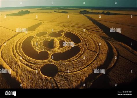 A Drone View Of Crop Circles At Sunset Used To Represent An