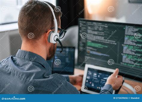Software Developer Is Writing Code Man In Formal Clothes Is Working In The Modern Office Stock
