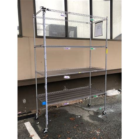 Four Tier Industrial Rolling Shelving Rack Approx 7 12ft Tall X 59in