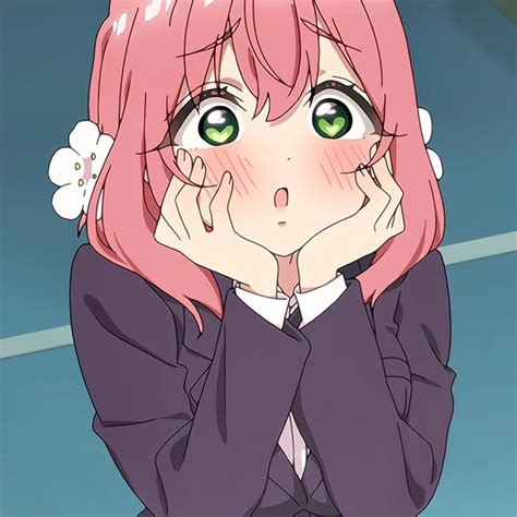 A Girl With Pink Hair And Green Eyes Is Looking At The Camera While