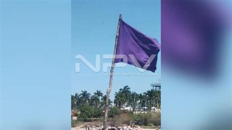 Colocan Bandera Morada En Playa Garza Blanca Noticiaspv