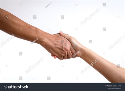Hand Reaching Down Another Hand Helping Stock Photo