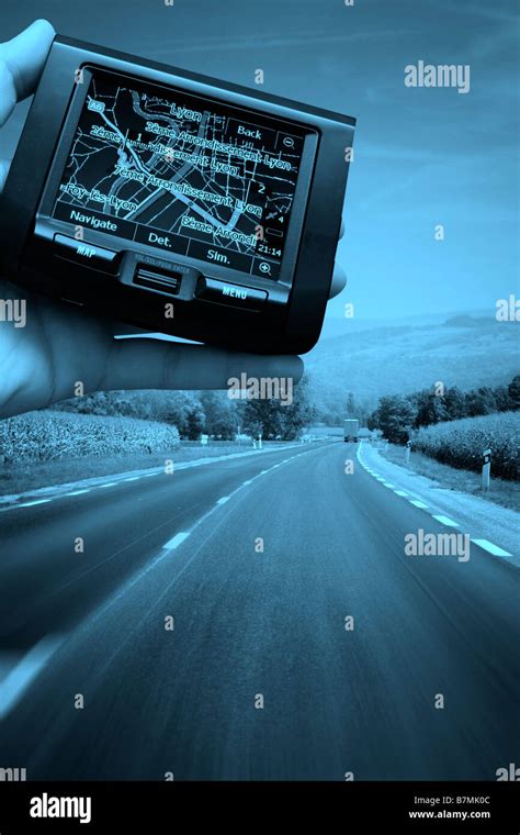 GPS Vehicle Navigation System In A Man Hand Stock Photo Alamy