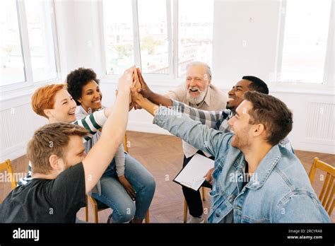 High Angle View Of Happy Overjoyed Multicultural And Different Ages