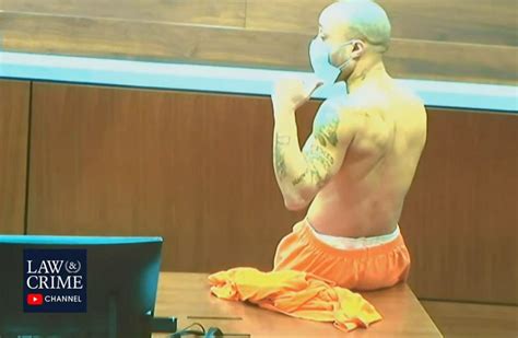 Photo Darrell Brooks Sitting Ontop Of Courtroom Table Shirtless Like He