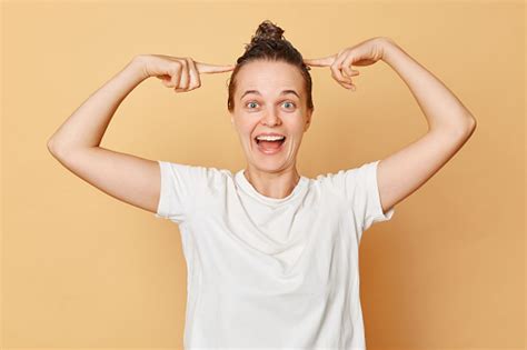 Excited Overjoyed Woman Wearing White Tshirt Washes Hair Standing With
