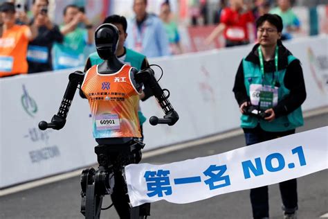 Humanoid Robot Marathon Chinas First Ends In Human Victory Glob Za