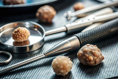 Closeup Of Surgical Tools And Biopsy Specimens On A Tray Premium Ai Generated Image