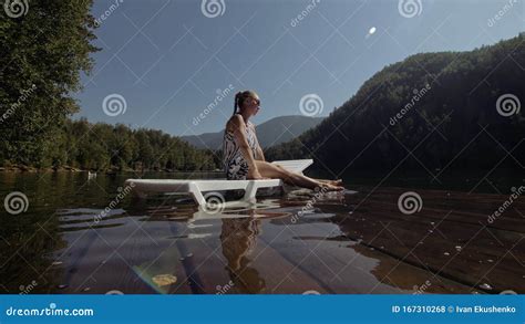 Woman Lie On A Sunbed In Sunglasses And A Boho Silk Shawl Girl Rest On