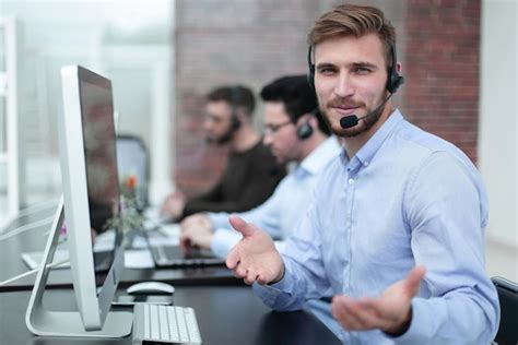 Premium Photo Friendly Staff With A Headset In The Workplace In The