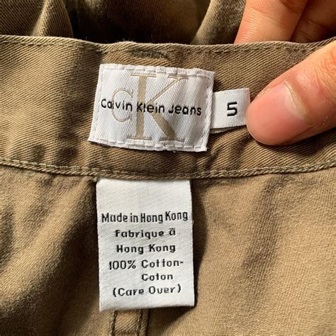 Calvin Klein Mens Khaki And Tan Trousers Depop