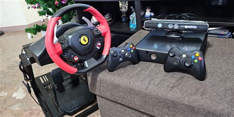 Microsoft Xbox With Motion Sensor And Driving Wheel Video Gaming