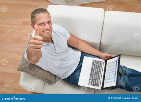 Man Showing Thumb Up While Working On Laptop Stock Image Image Of