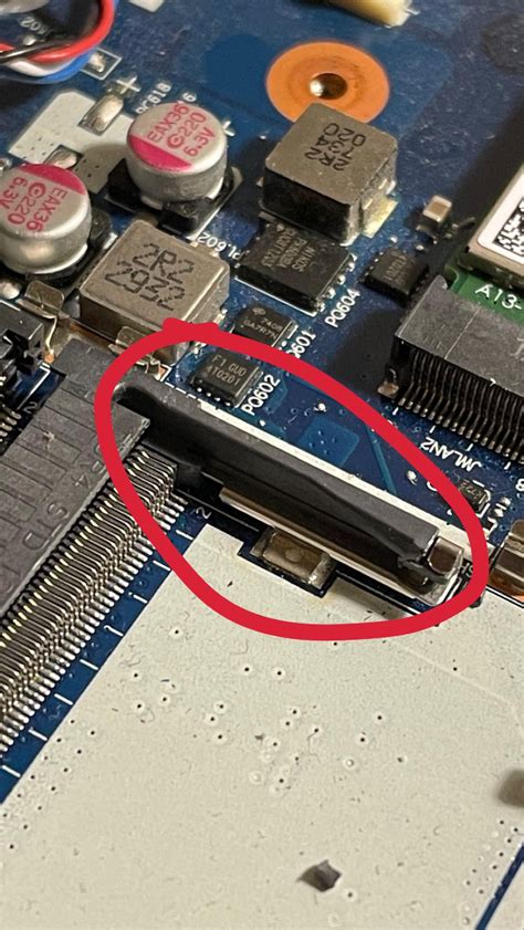 How Can I Remove This Plastic Piece So That I Can Add My Second Memory