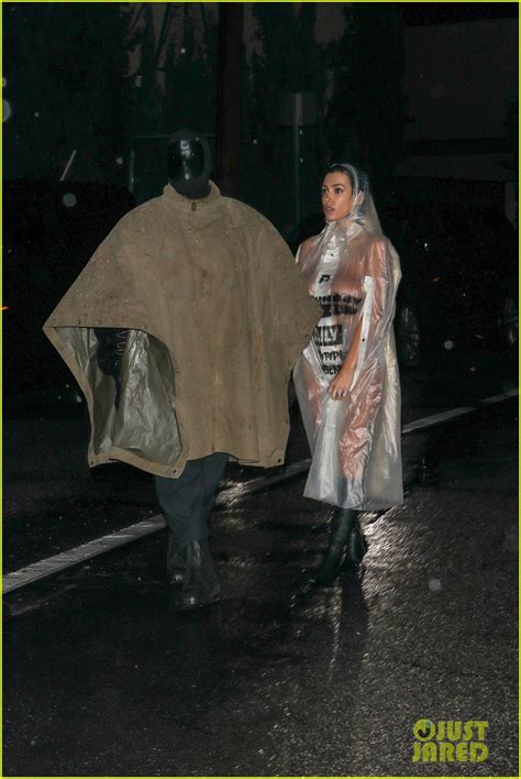 Kanye Wests Wife Bianca Censori Braves The Rain In See Through Poncho