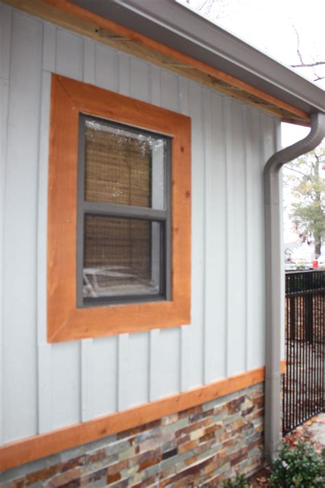Modern Craftsman Exterior With Board And Batten Siding Ledger Stone And Cypress Trim Window