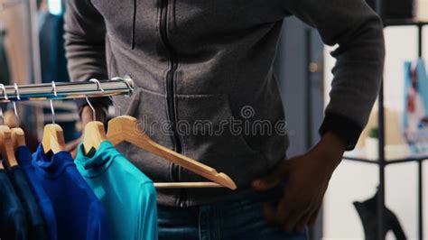 Thief Shoplifting Trendy Clothes Stock Video Video Of Steal Burglary