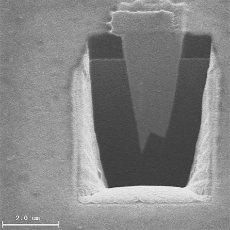 Fib Image Of Incomplete W Deposition In Micro Machined Via Fig 4 Fib