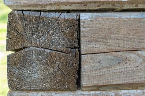Premium Photo The Wall Of An Old Wooden House Made Of Timber Or Log