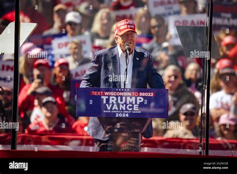 Donald Trump Gives A Speech Behind Bullet Proof Glass At An Outdoor