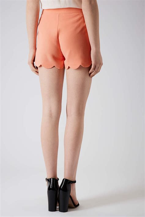 Lyst Topshop Apricot Scallop Hem Shorts In Orange