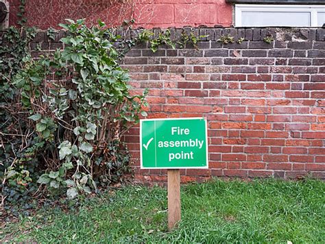Assembly Point Sign Background Images Hd Pictures And Wallpaper For
