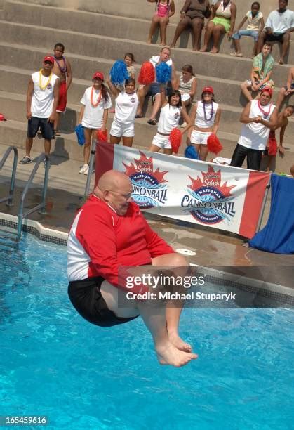 Cannonball Into Pool Splash Photos And Premium High Res Pictures