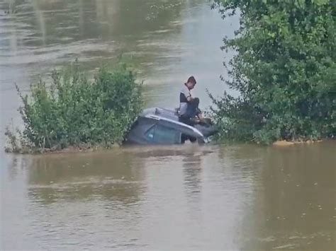 Odisha Two Men Rescued After Their Car Gets Stuck On Flooded Road