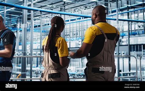 Industry 40 Industrial Plant Engineering Team Controlling Automated