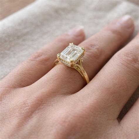 Emerald Cut Moissanite Engagement Ring In Yellow Gold With Claw Double Prong Setting Vintage