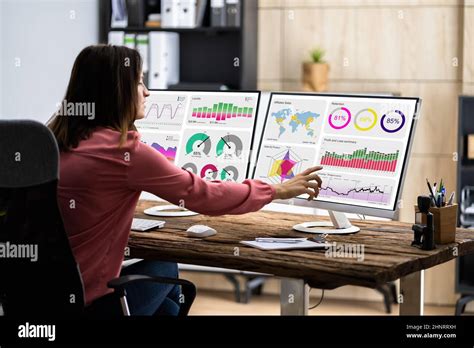 Analyst Woman Looking At Business Data Analytics Dashboard Stock Photo Alamy