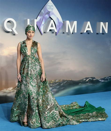 Amber Heard Wears A Valentino Couture Bathing Cap To The Aquaman