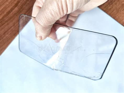Removing Protective Film From A Cracked Screen Peeling Off A Cracked