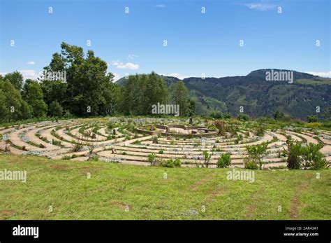 Beautiful Concrete Maze Surrounded By Grass Covered Fields And Trees