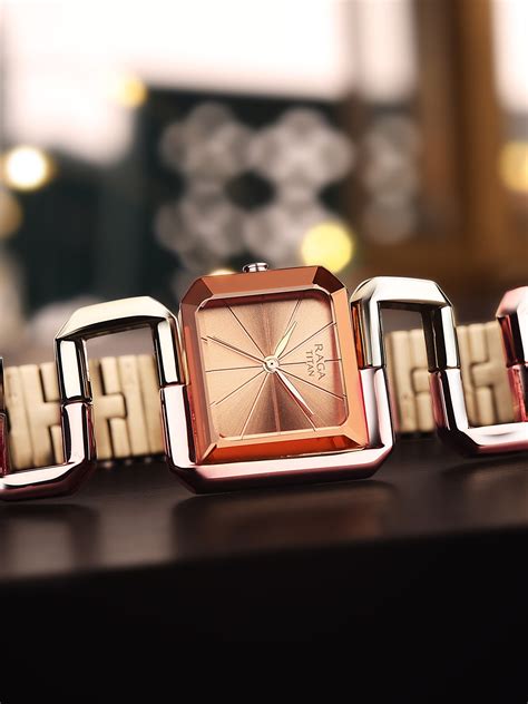 Buy Titan Women Rose Gold Toned Brass Embellished Dial And Gold Toned